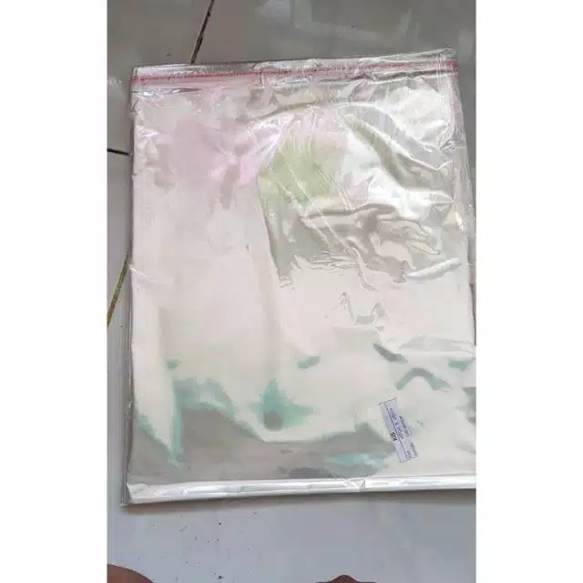 Opp baju / plastik bungkus baju pakaian / klip perekat bungkus pakaian ...